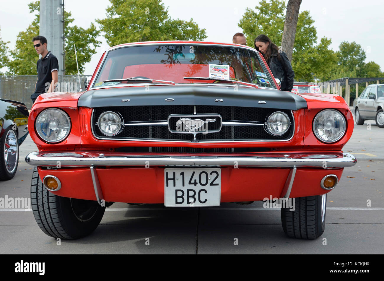 Red ford mustang driving trees hi-res stock photography and images - Alamy