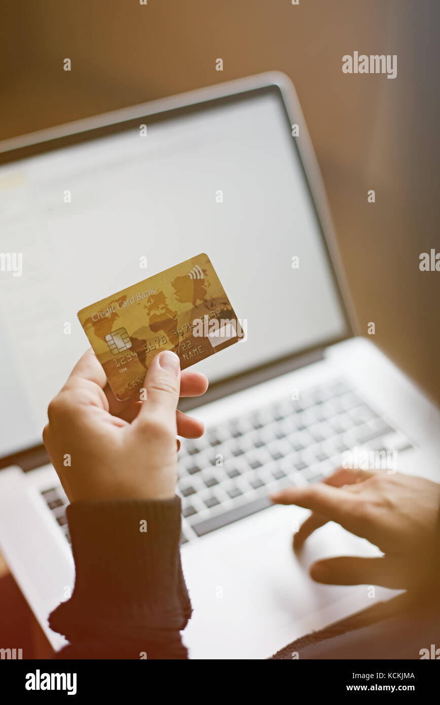 Woman using credit card for online purchase Stock Photo - Alamy