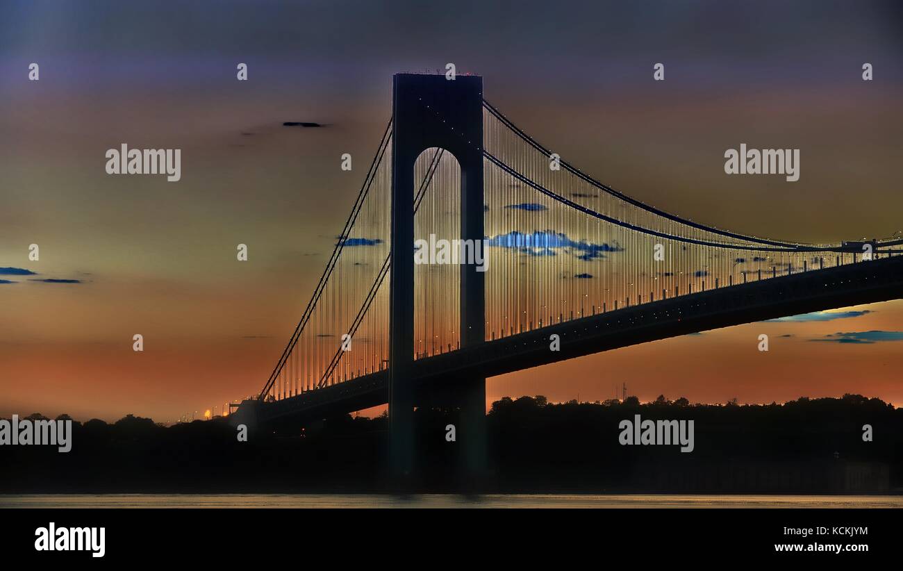 Suspension Bridge At Night Stock Photo - Alamy