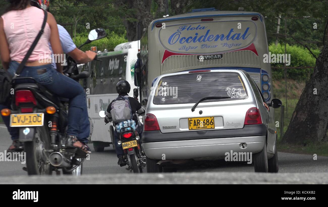 Motorcycles Cars And Bus Traffic Driving Stock Photo - Alamy