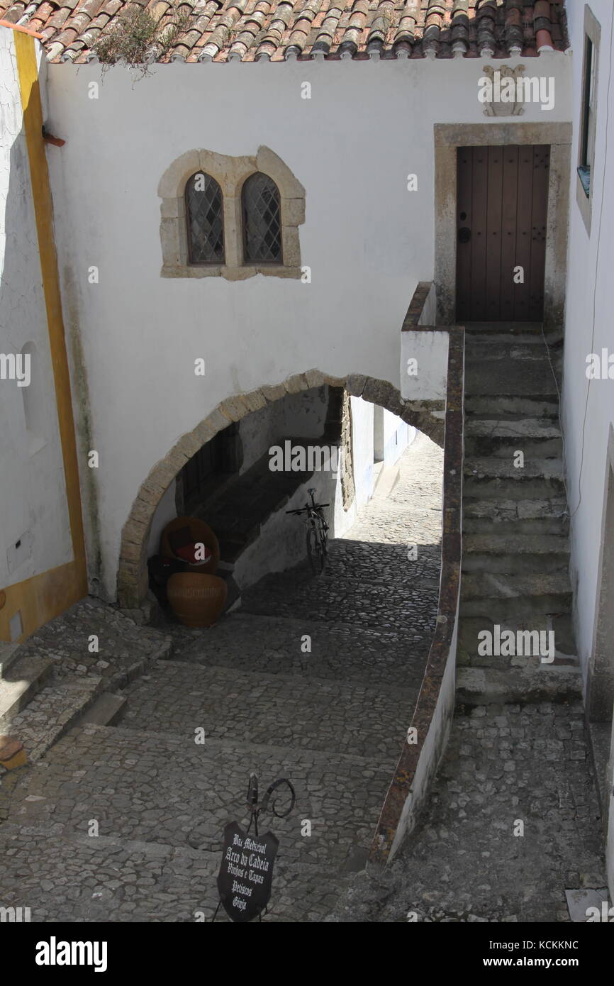 Old stone archway in Obidos / Portugal Stock Photo - Alamy