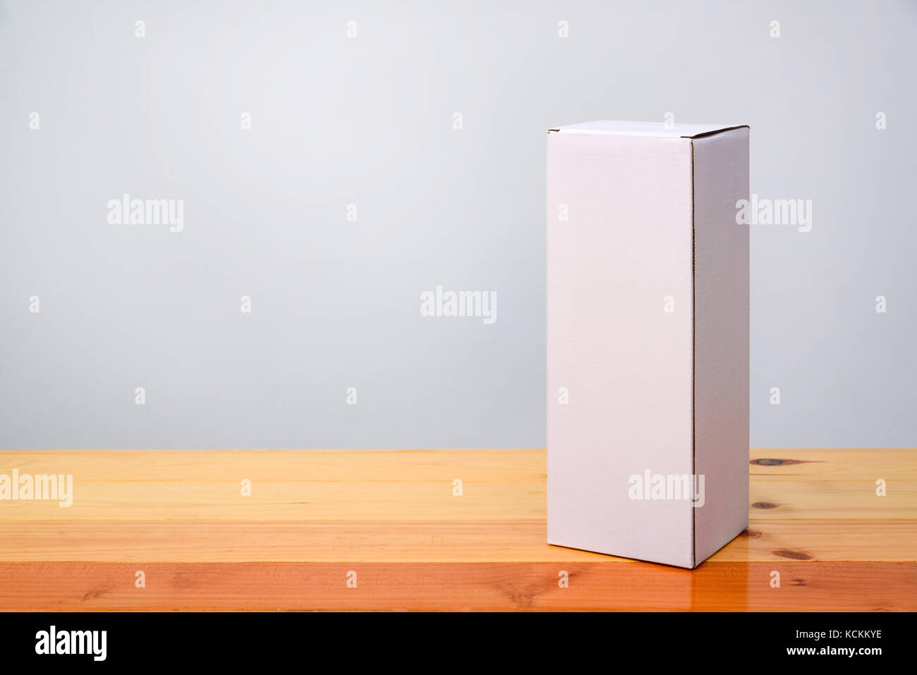 Empty Package white cardboard box mock up for long items on bright ...