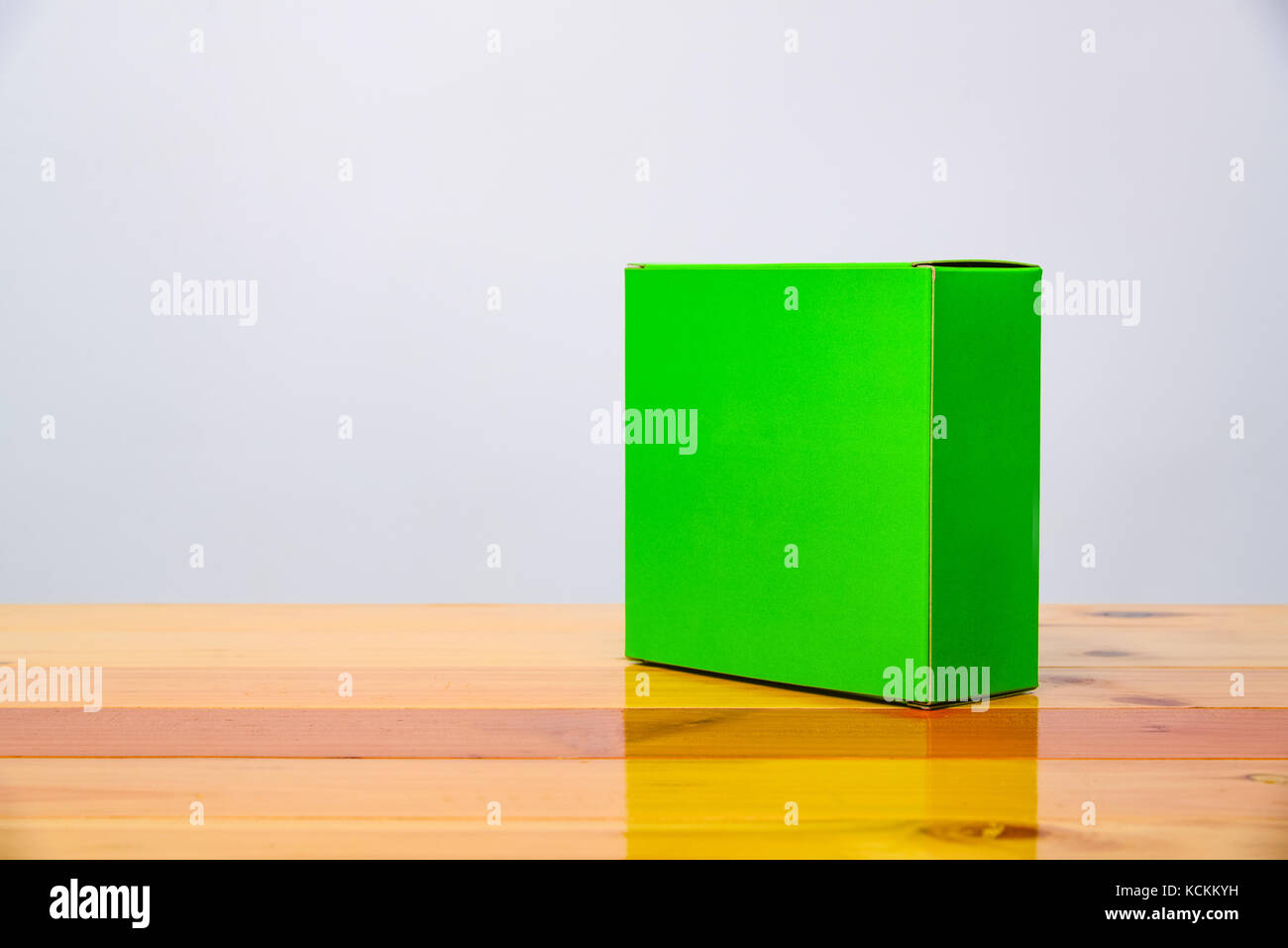 Empty Package green cardboard box mock up for product items on bright ...