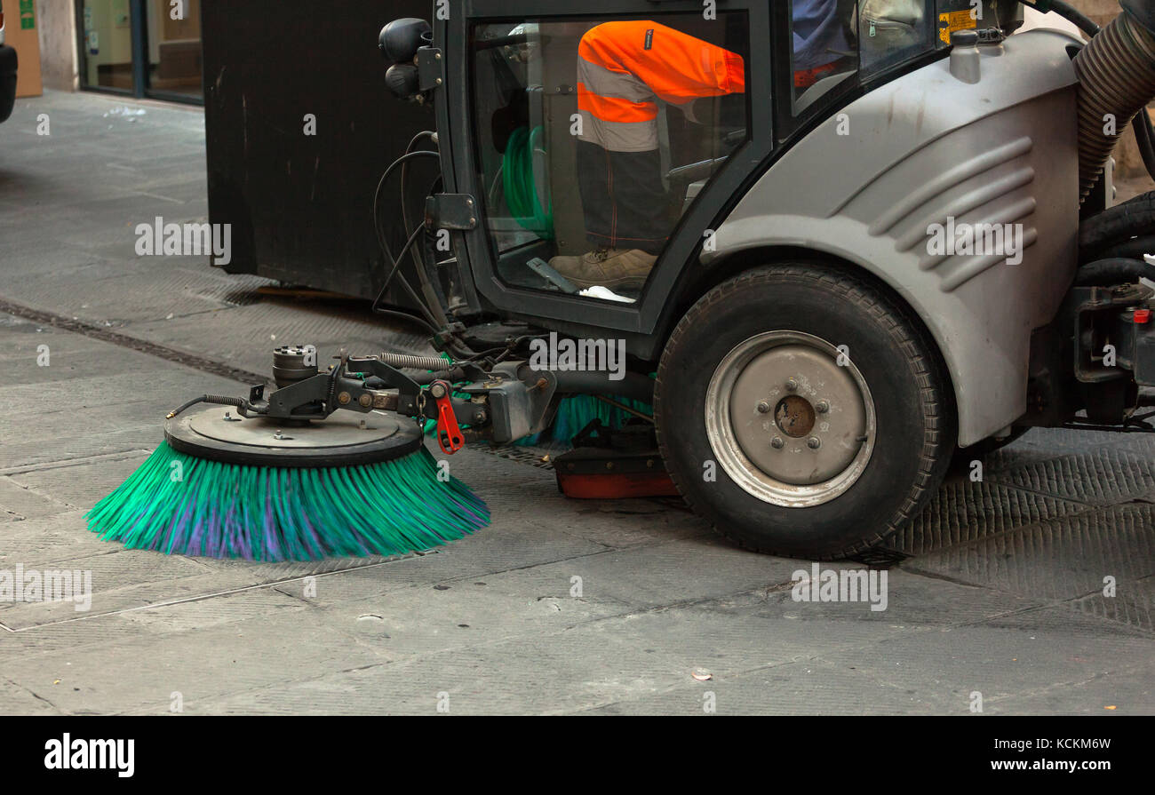 A street sweeper machine cleaning the streets Stock Photo - Alamy