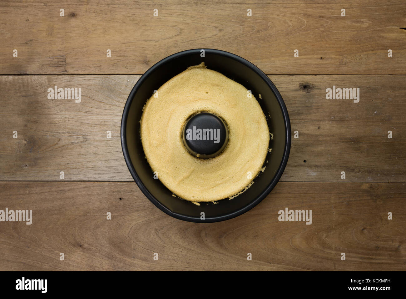 Coffee cotton cake in black round tube cake pan, ready to eat, on ...