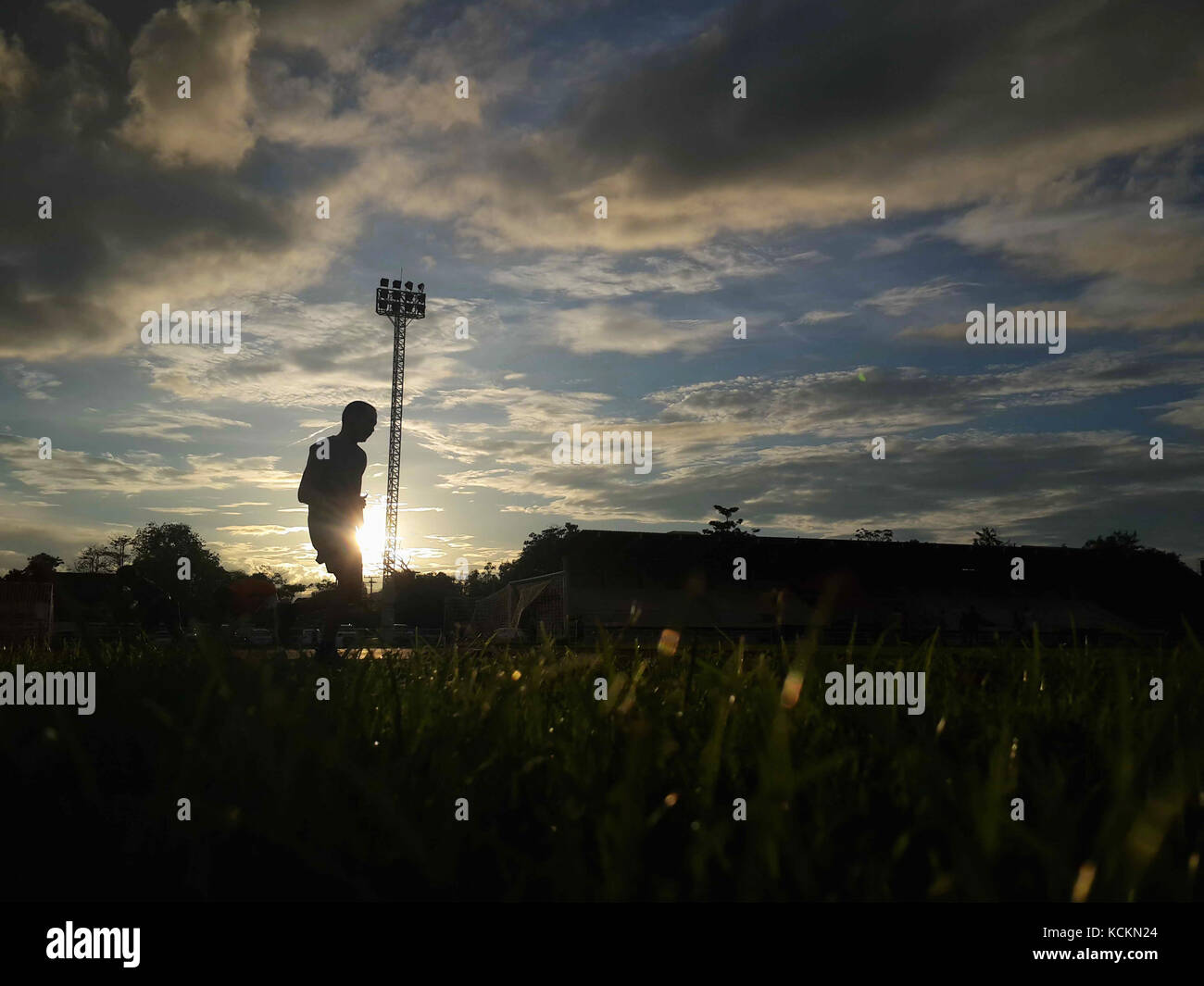 Silhouette running on road at sunrise. Fitness and workout wellness ...
