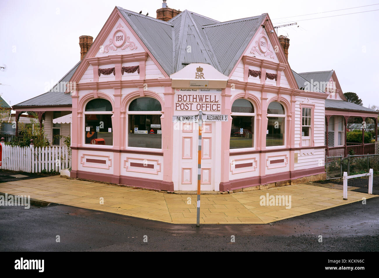Former post office, built as a bank in 1891. The rail on the right is a ...