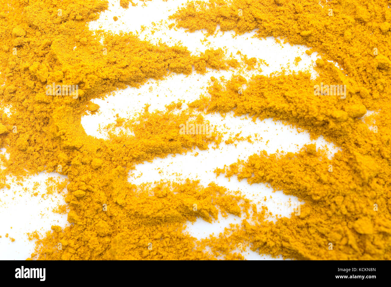 turmeric powder isolated on white background Stock Photo - Alamy