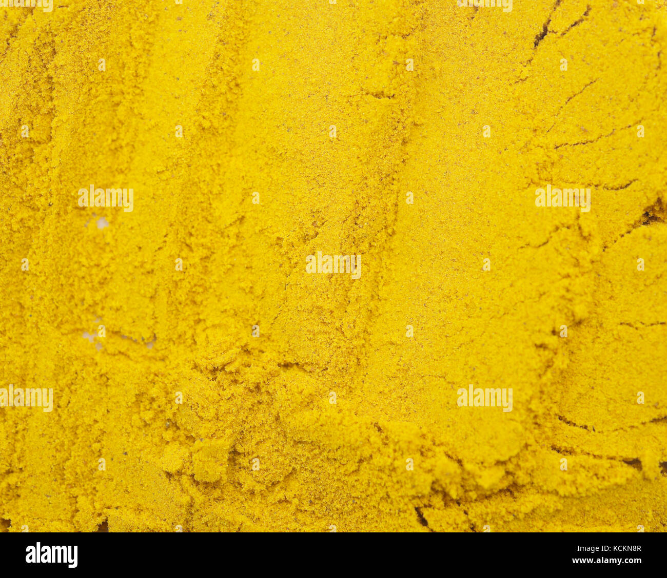 turmeric powder background Stock Photo - Alamy