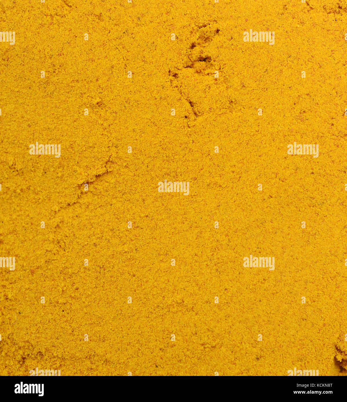 turmeric powder background Stock Photo - Alamy