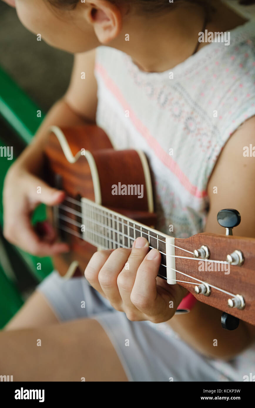 Woman play ukulele hi-res stock photography and images - Alamy