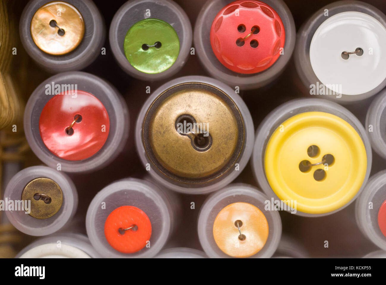 Tubes of Buttons Stock Photo - Alamy