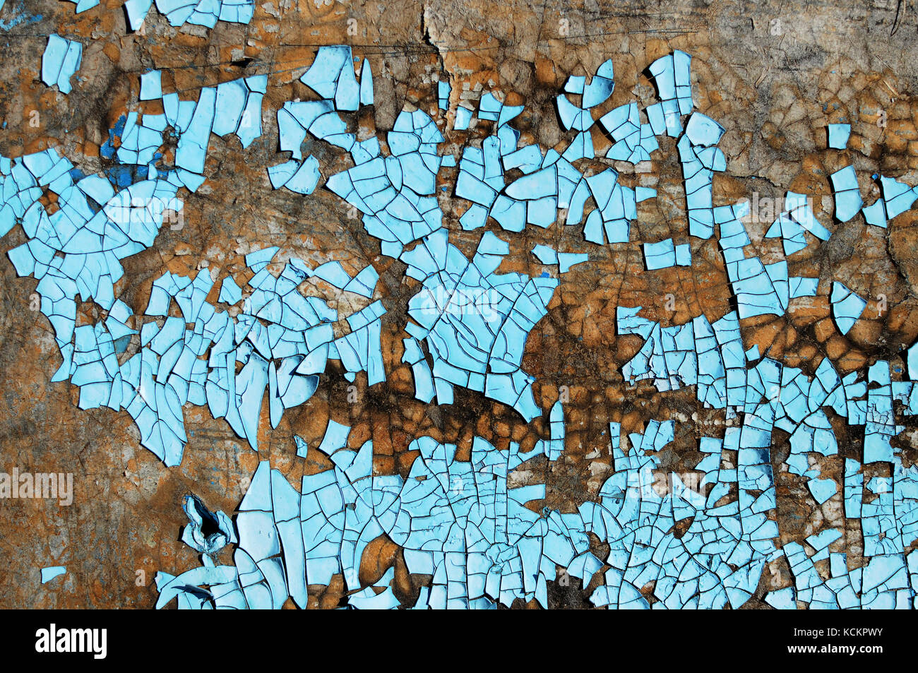 Rustic hardboard texture with scratches, cracks and blue peeling paint ...