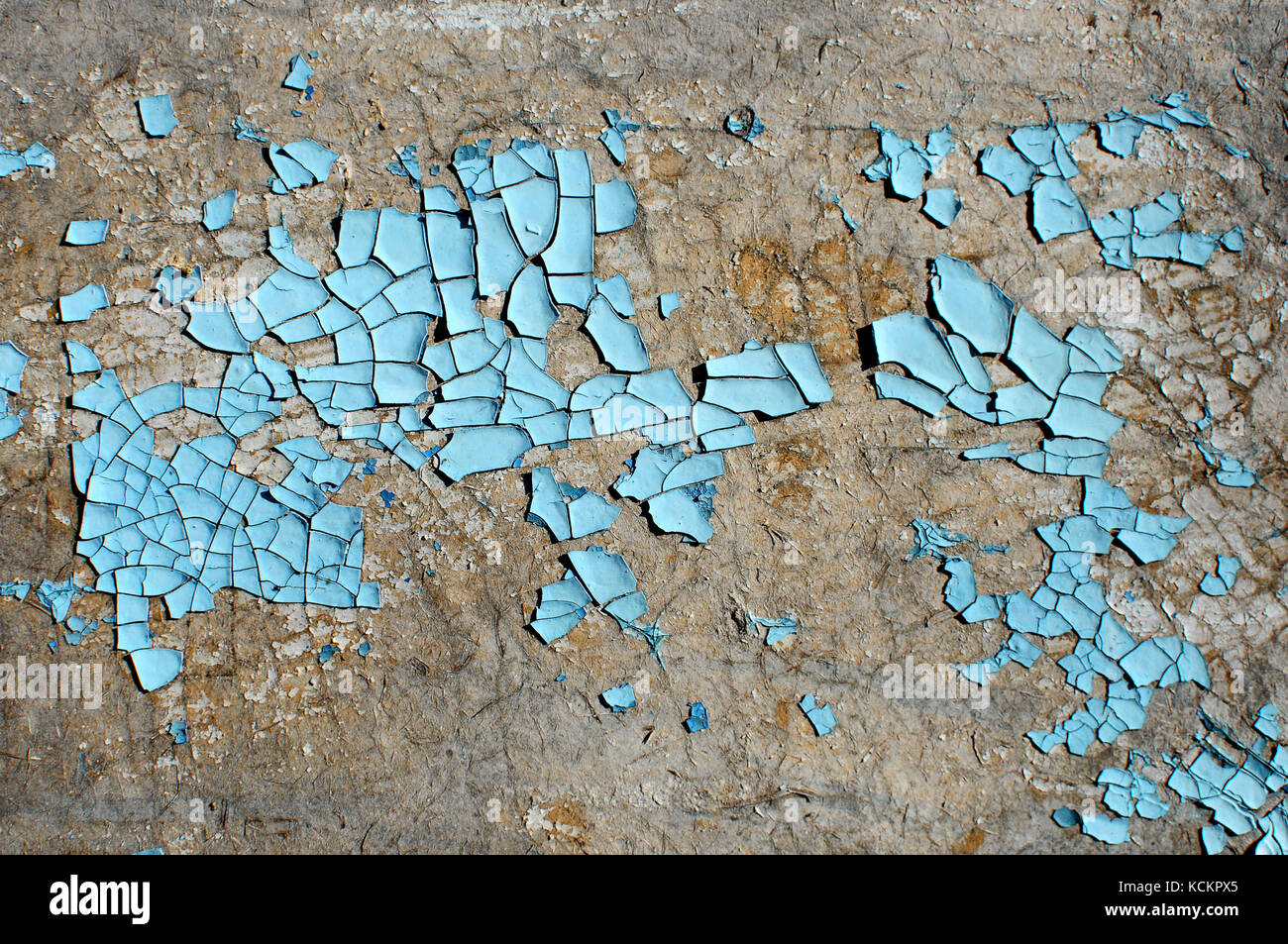 Rustic hardboard texture with scratches, cracks and blue peeling paint ...