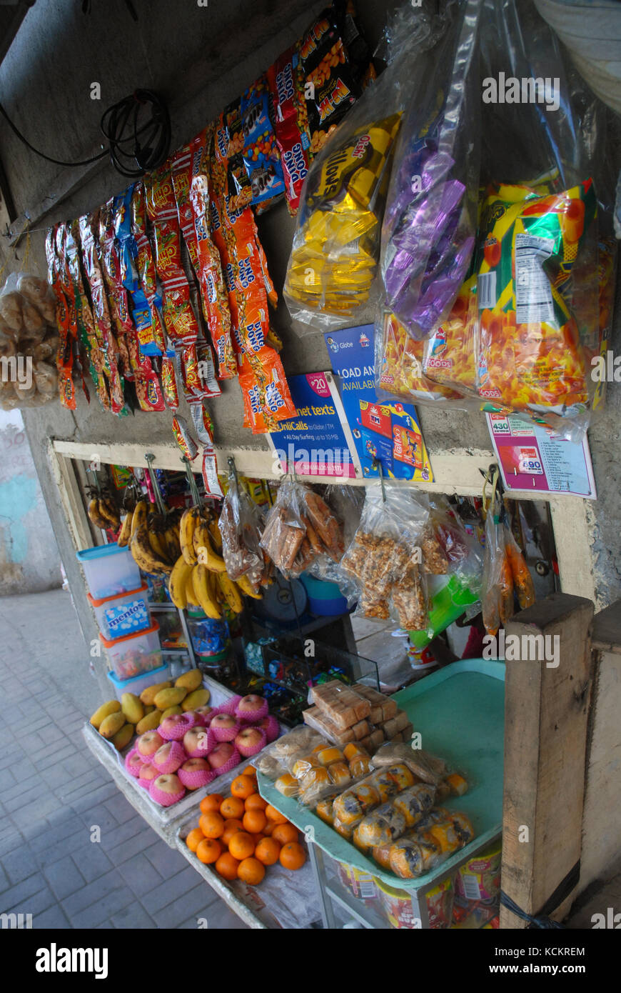 Packets of snacks and products on display at sari-sari store, Cebu ...
