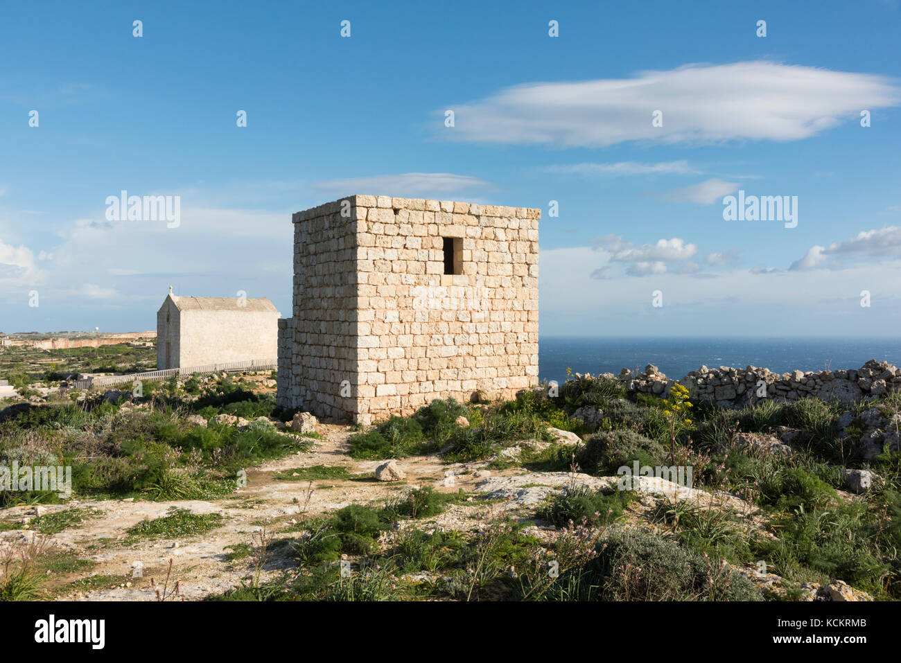 A stone watchtower and the Magdelene Chapel on the Dingli Cliffs Malta ...