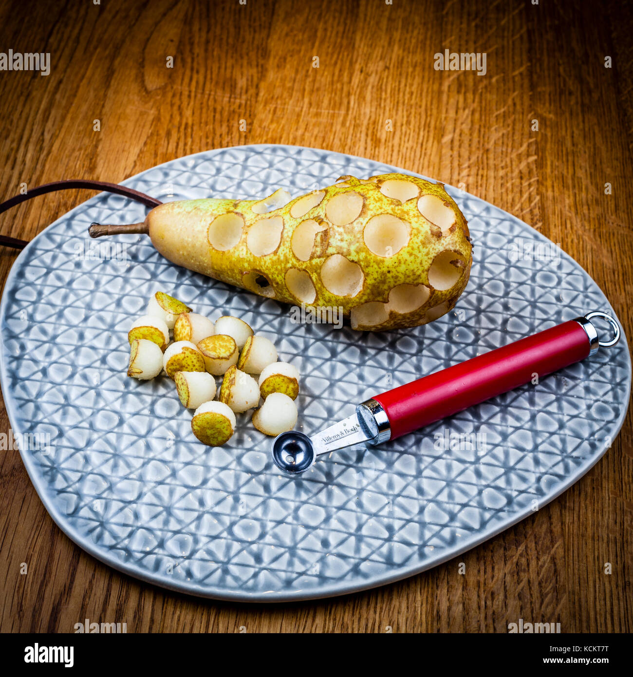 Pear Balls. Kitchen tool used to cut fruit balls from a pear for ...