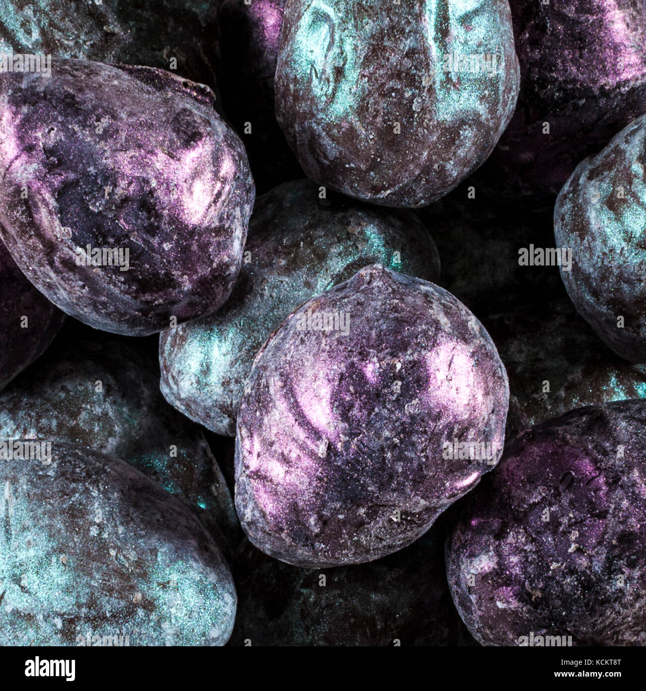Chocolate balls in a green or magenta metallic look Stock Photo - Alamy