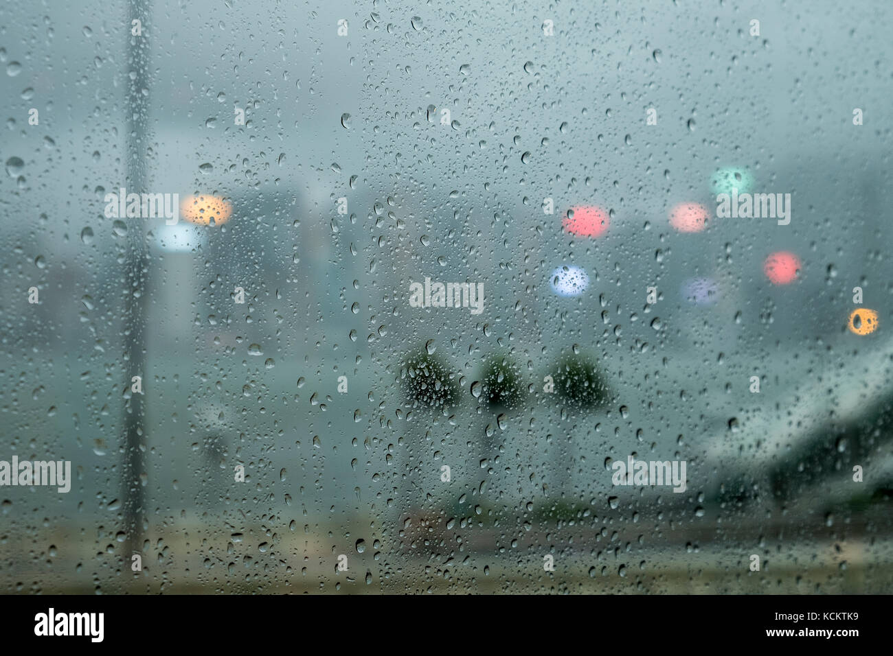 Raindrops on window during Typhoon Hato. waterfront, Victoria Harbour ...