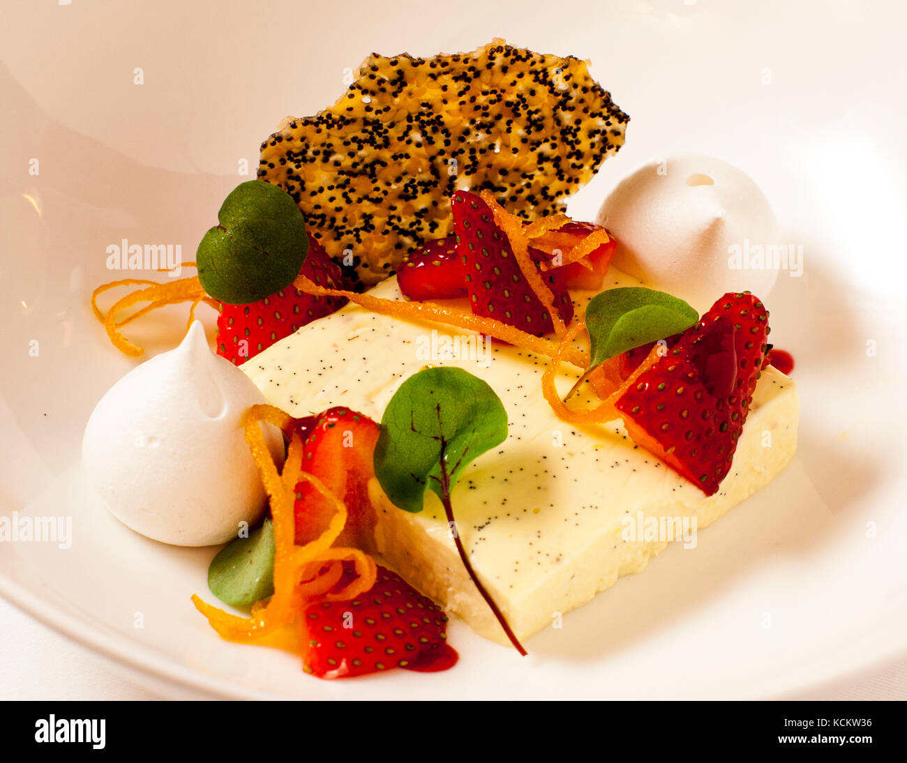 Vanilla panacotta with grappa, strawberries and meringue. The panacotta ...