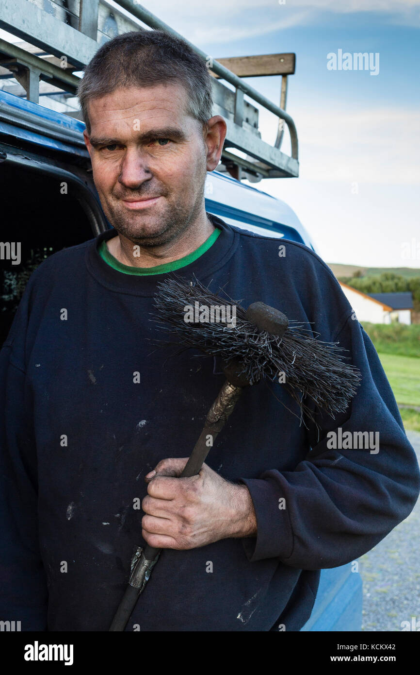 Chimney sweep covered in soot with dirty hands and face Stock Photo - Alamy