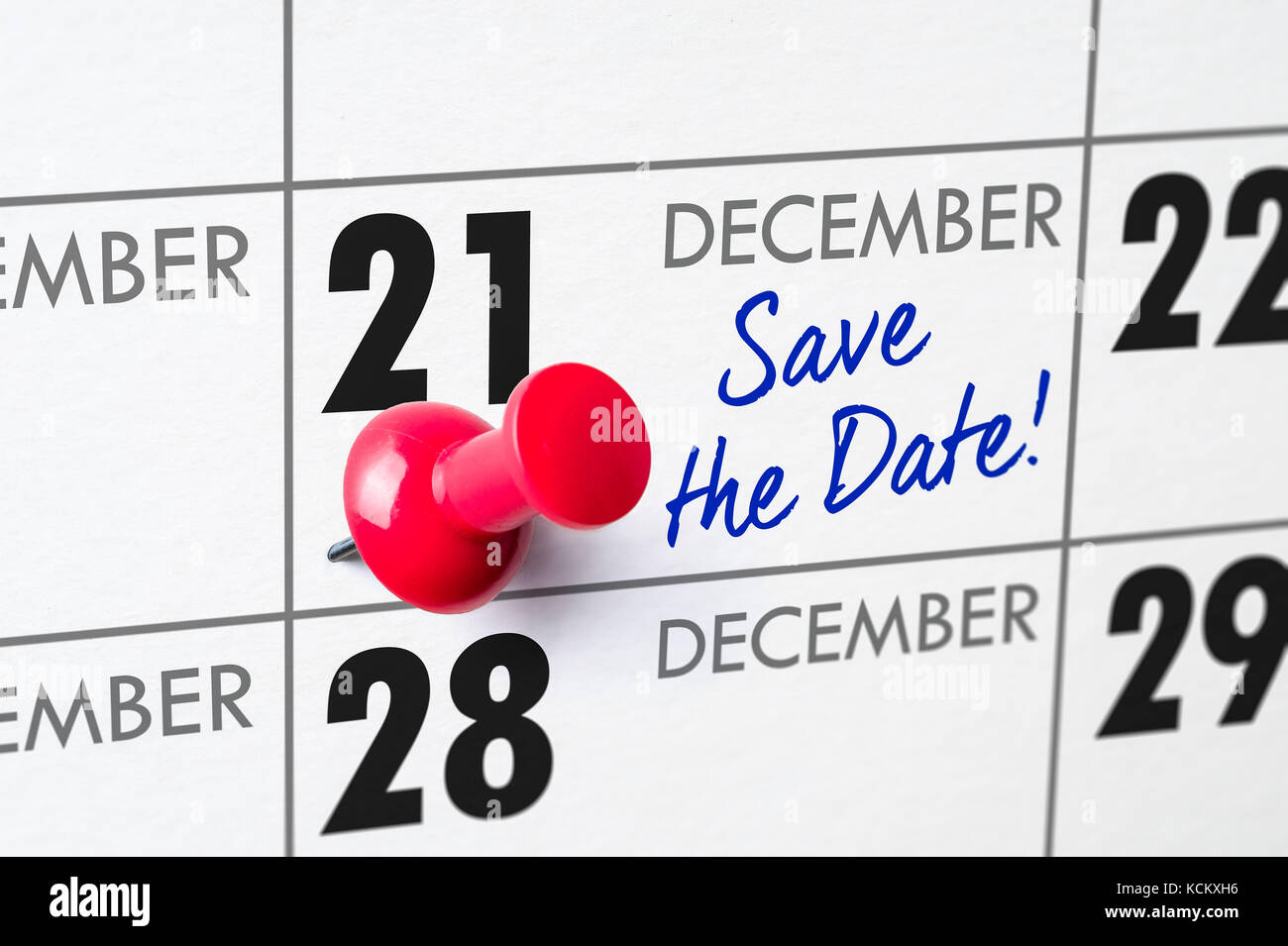 Wall calendar with a red pin - December 21 Stock Photo - Alamy