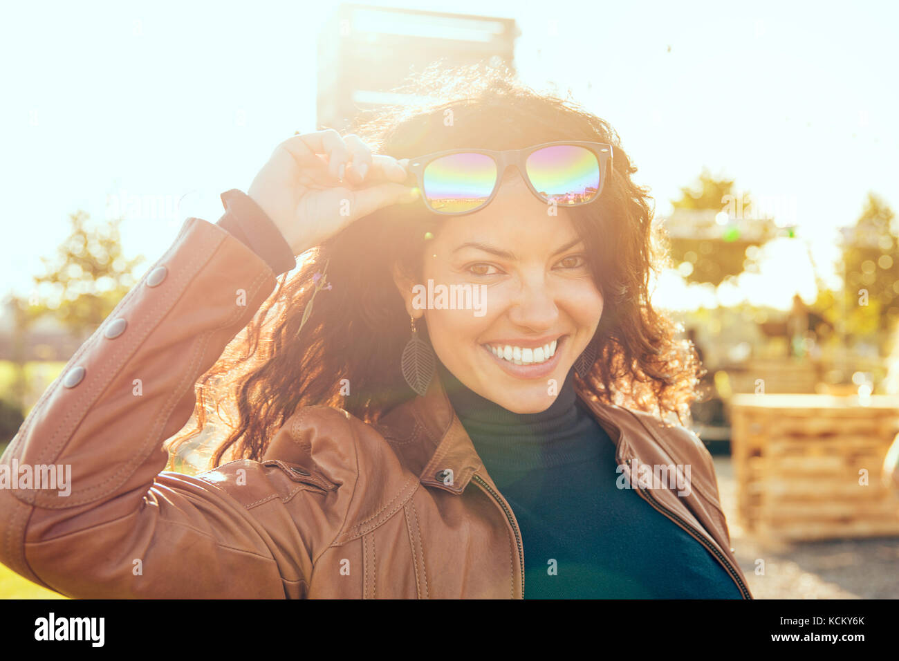 Portrait of a smiling happy woman having fun Stock Photo - Alamy