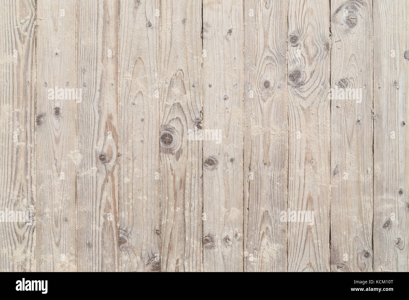 Wooden beach boardwalk with sand, viewed from above, background Stock ...
