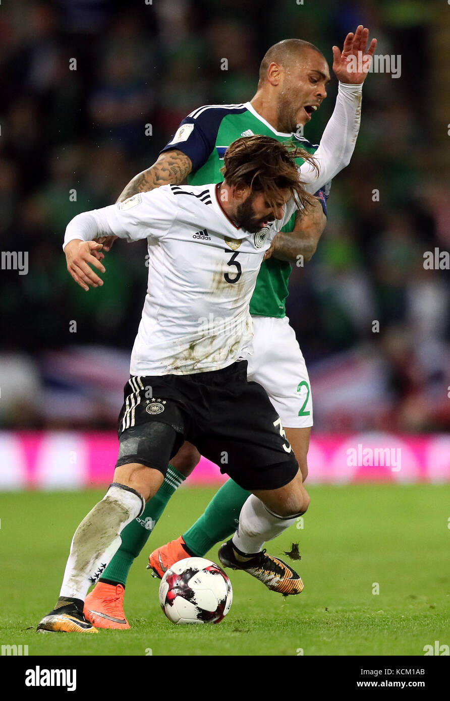 Northern Ireland's Josh Magennis (right) and Germany's Marvin ...