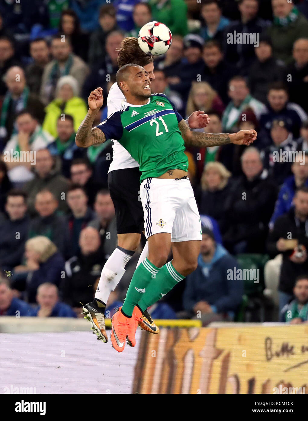Northern Ireland's Josh Magennis (front) and Germany's Marvin ...