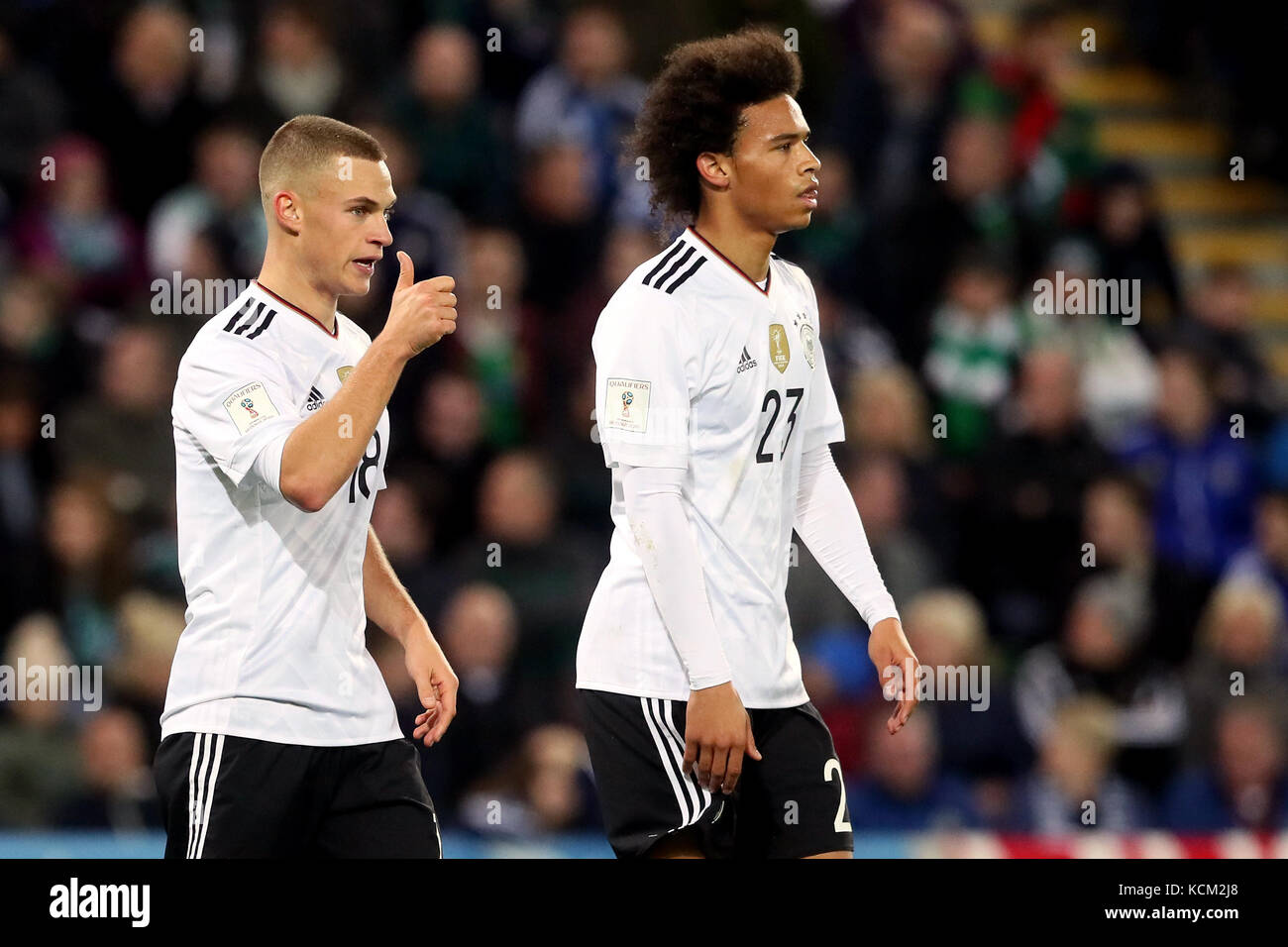 Germany's Joshua Kimmich (left) celebrates scoring his side's third ...
