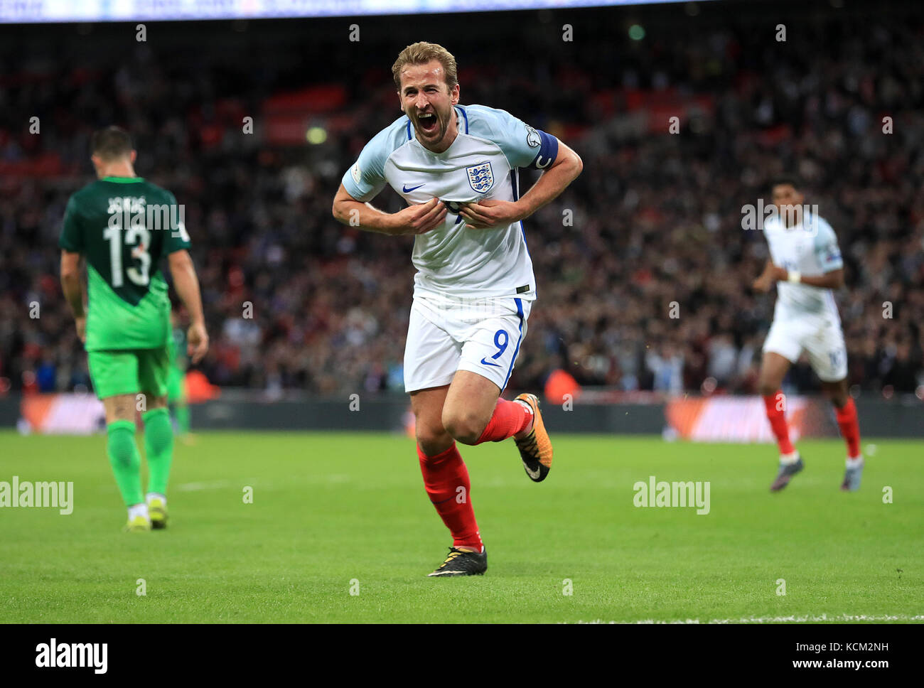 England's Harry Kane celebrates scoring his side's first goal of the ...