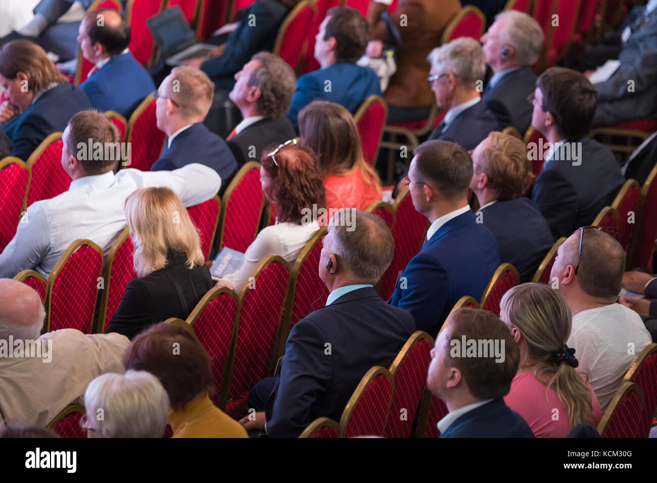 Audience listens to the lecturer Stock Photo - Alamy