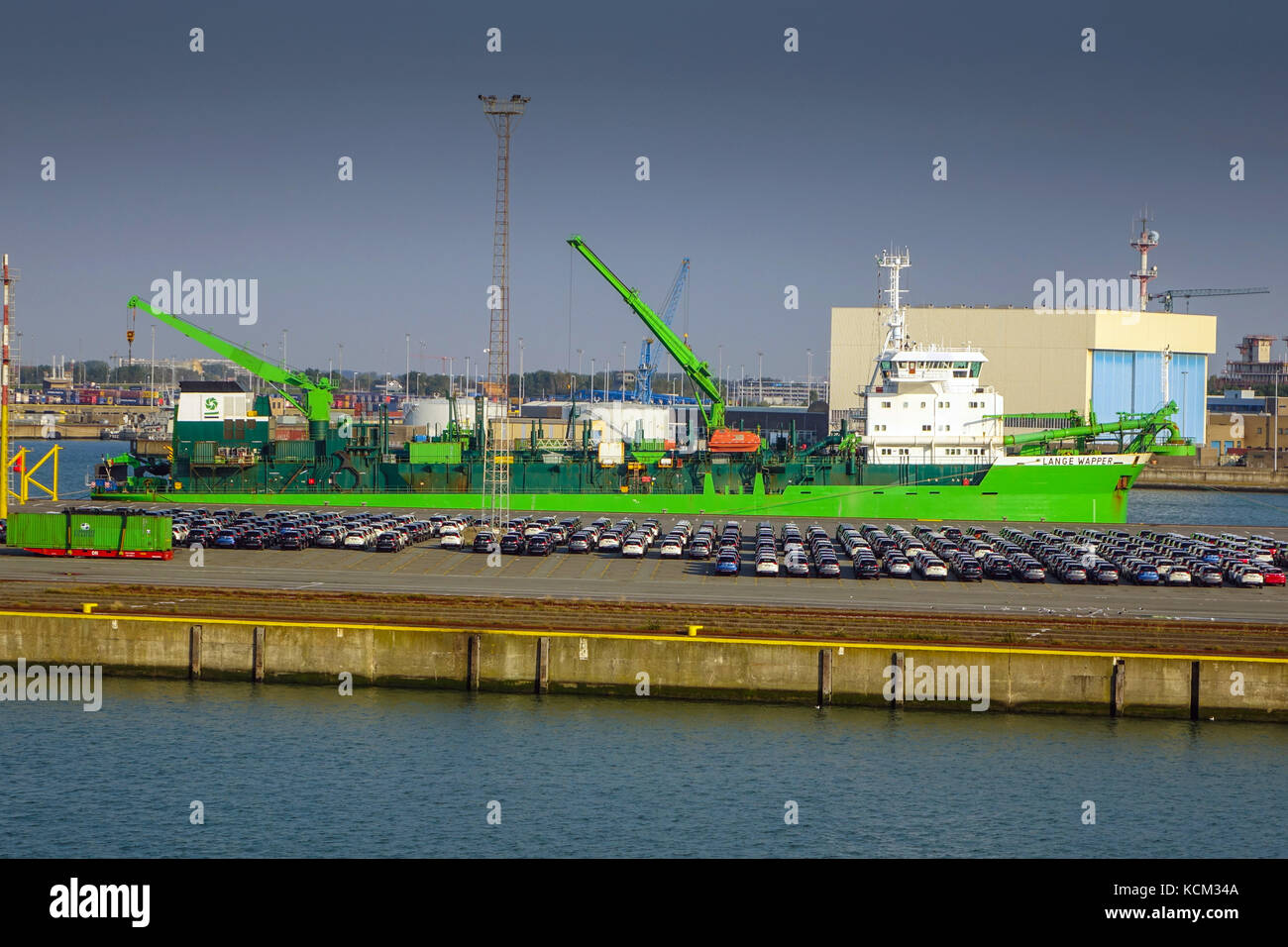 Lange Wapper dredger ship and many cars on harbour Zeebrugge Docks ...