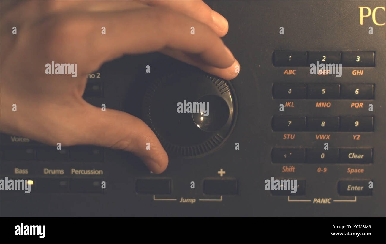 Hand tuning fm radio button. Retro image processed. Hand adjusting ...