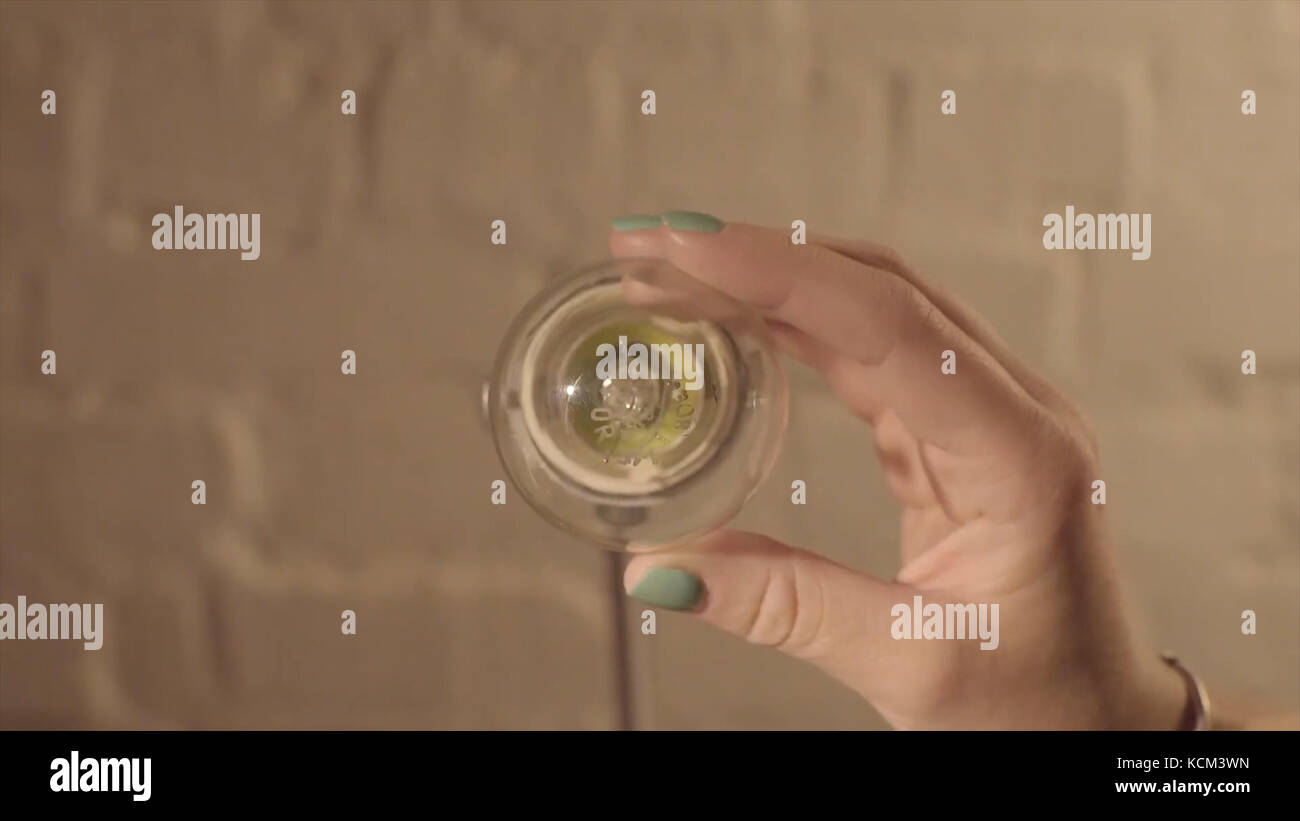 Hand turning off the bulb lamp.Turning off the light. Male hand turn on ...