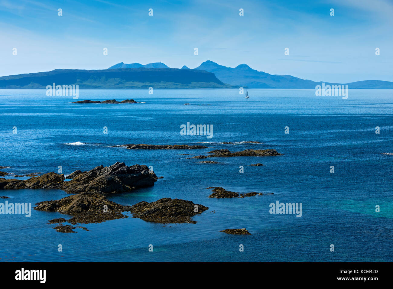 The Isle of Eigg and the Isle of Rum from near Port nam Murrach beach ...
