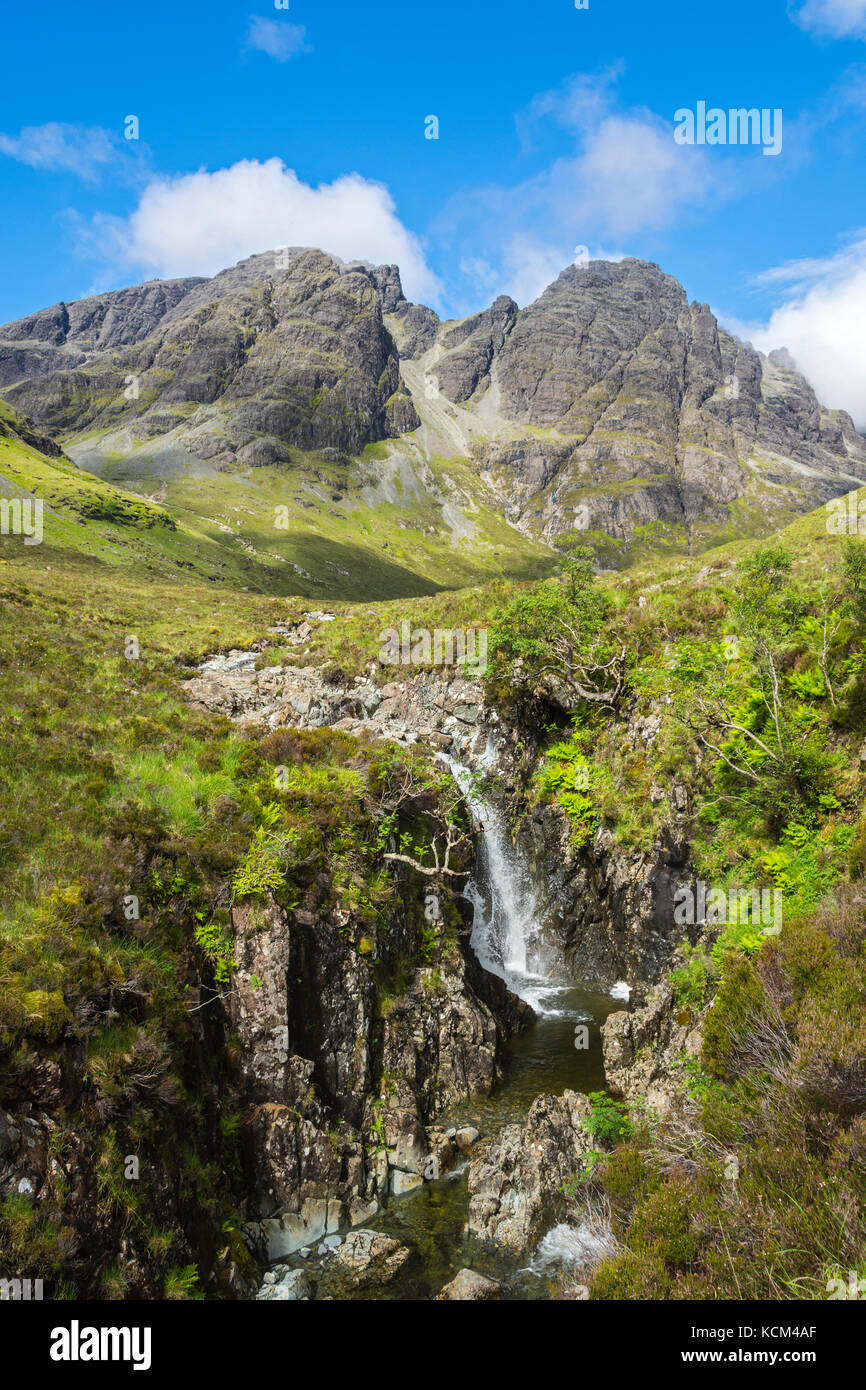 The peak of Bla Bheinn from a waterfall on the Allt na Dunaiche burn in ...