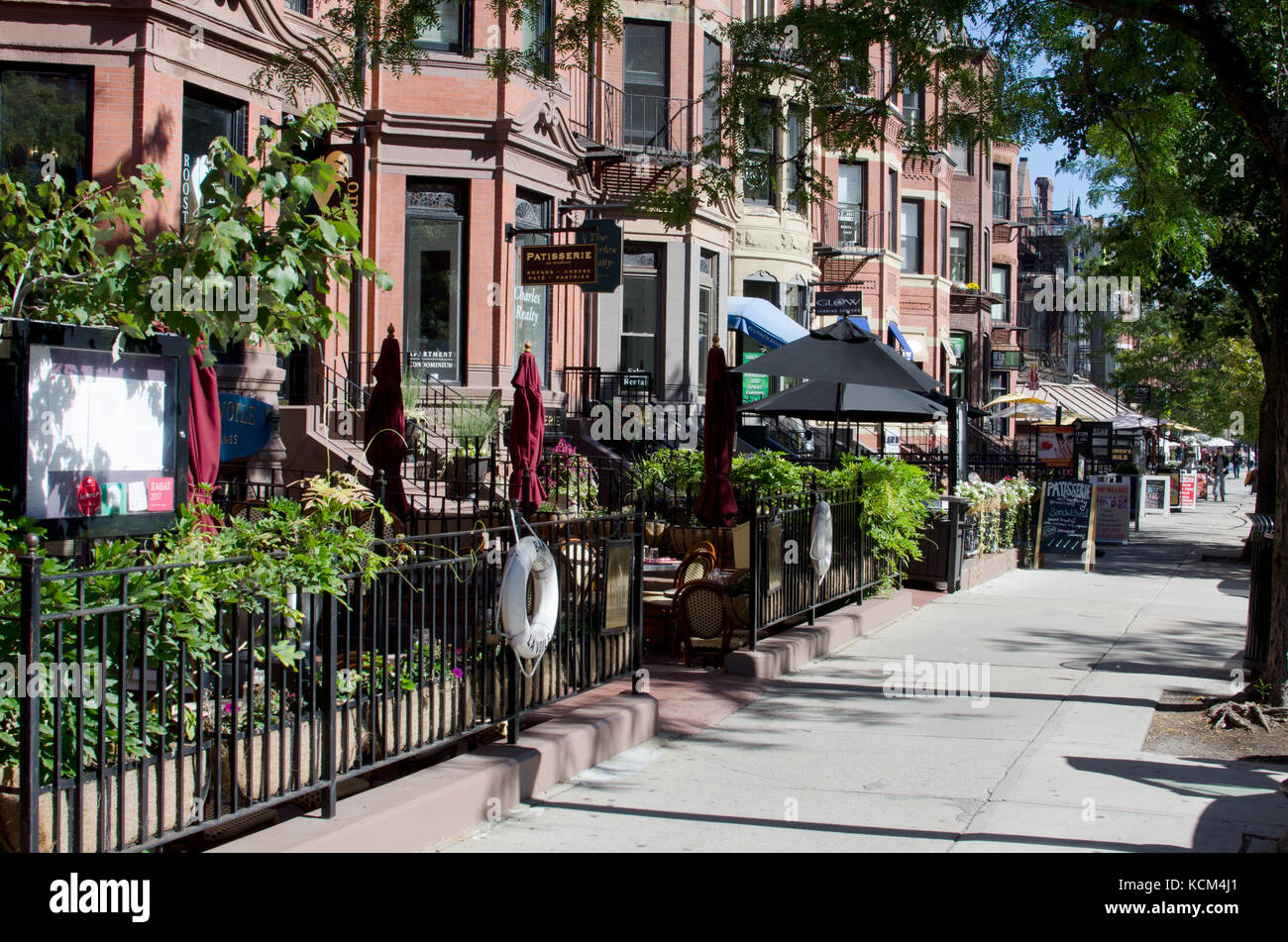 Outside dining restaurants along Newbury Street scene Back Bay Boston ...