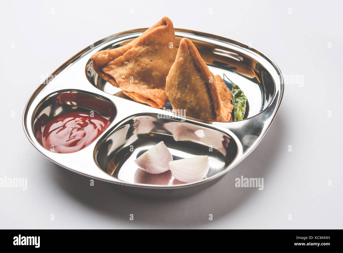 Samosa - Indian deep fried junk but tasty food or snacks served in ...
