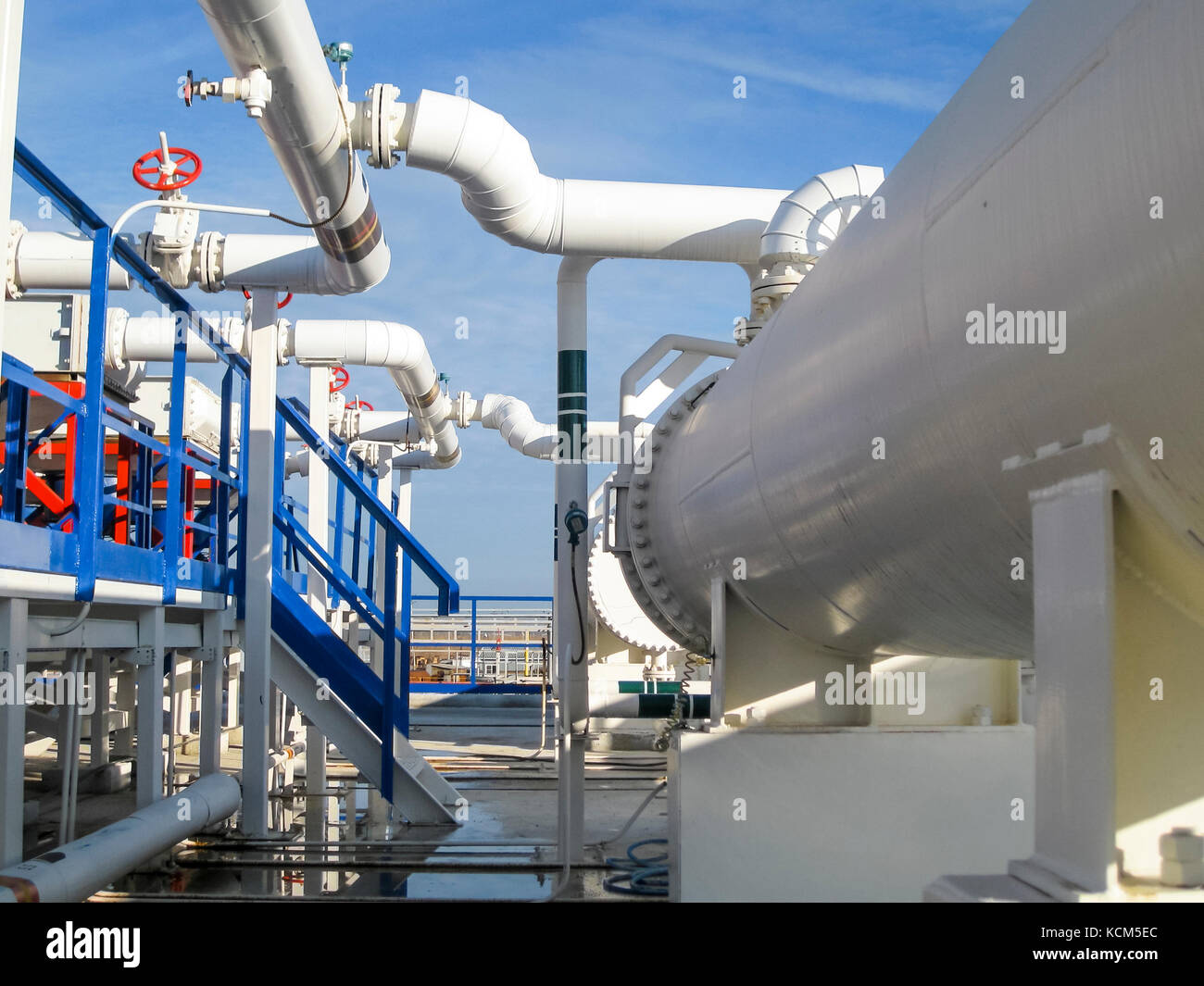 Heat exchangers in a refinery. The equipment for oil refining.Heated ...