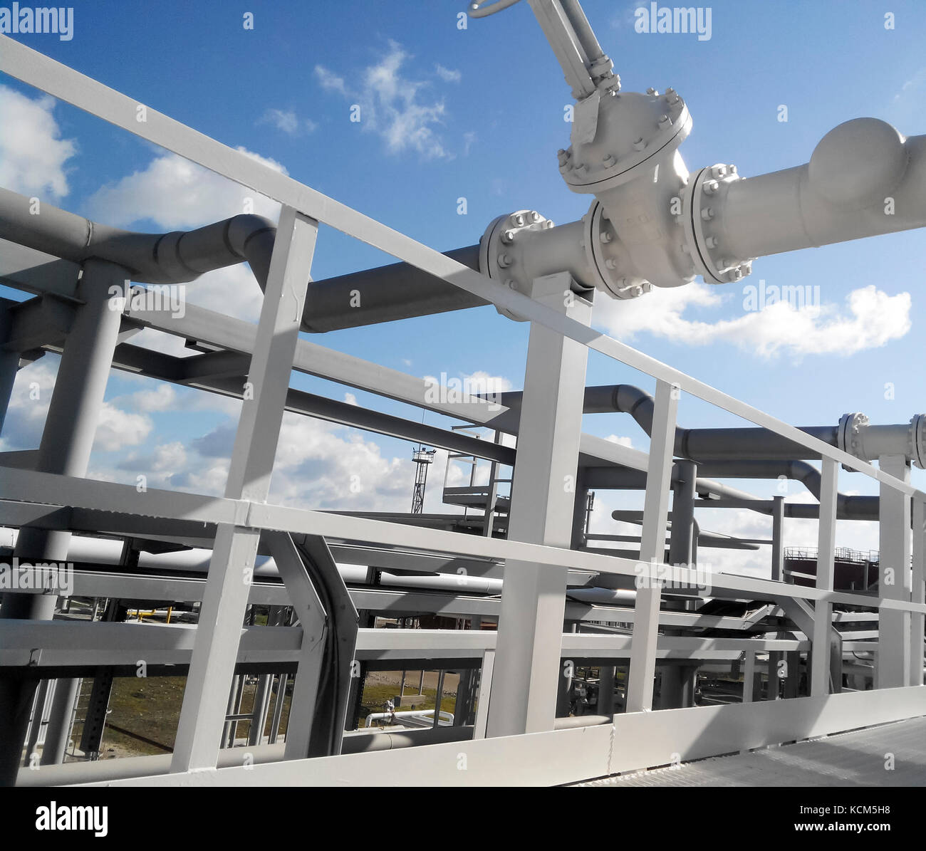 Latch on the pipeline Stock Photo - Alamy