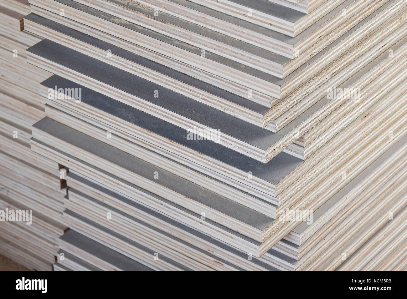 Stack of industrial plywood in construction site for background Stock ...
