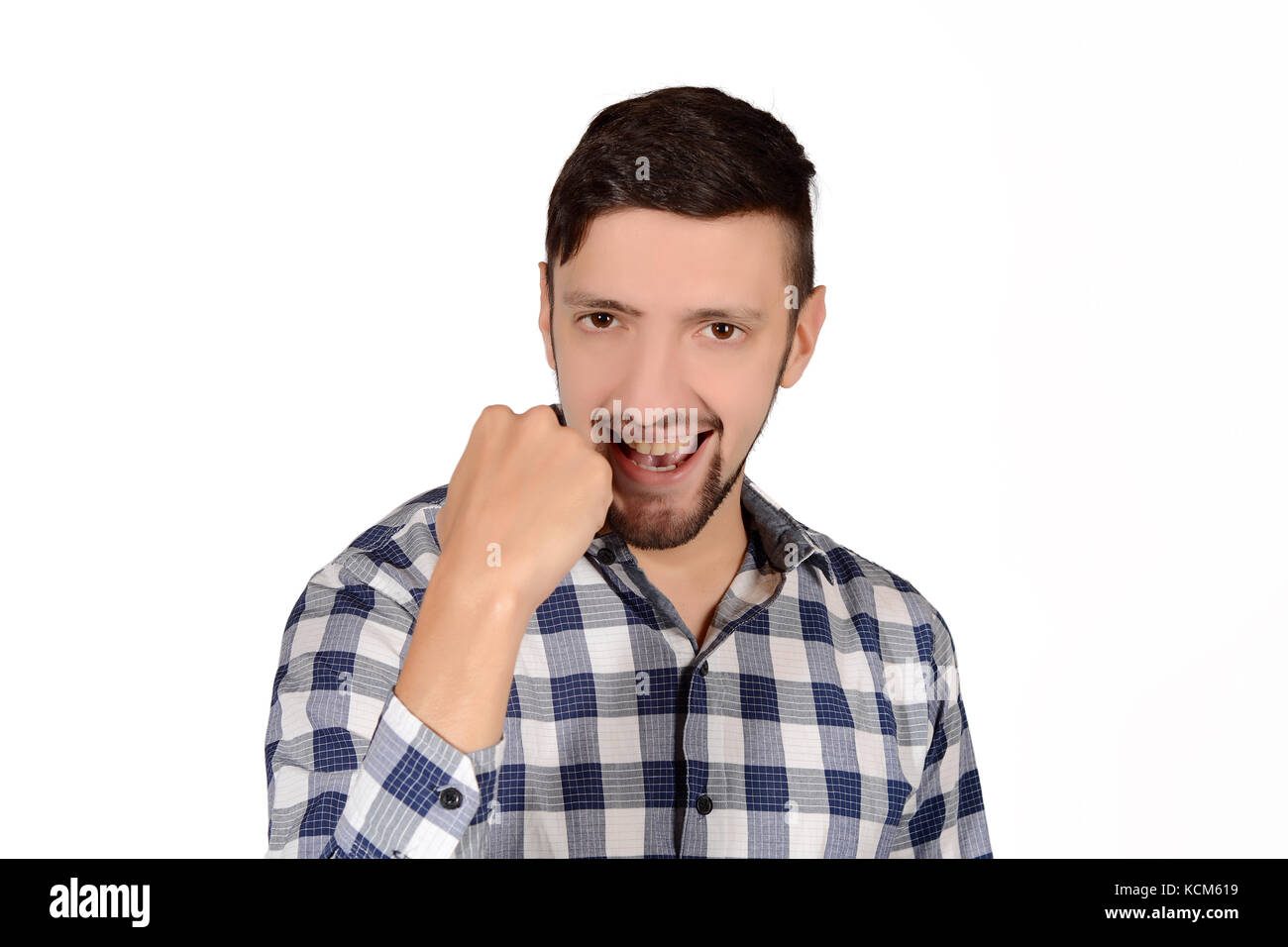 Portrait of a young latin man celebration victory. Isolated white ...