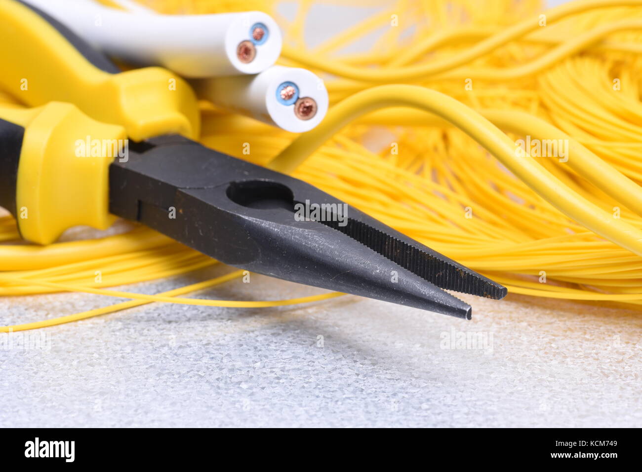 Tools and cables used in electrical home installation, closeup Stock ...