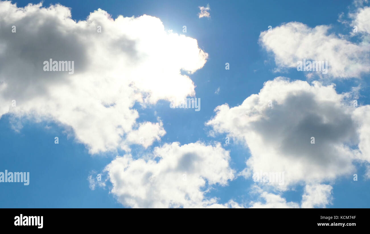 Beautiful cloudscape with large, building clouds and sunrise breaking ...