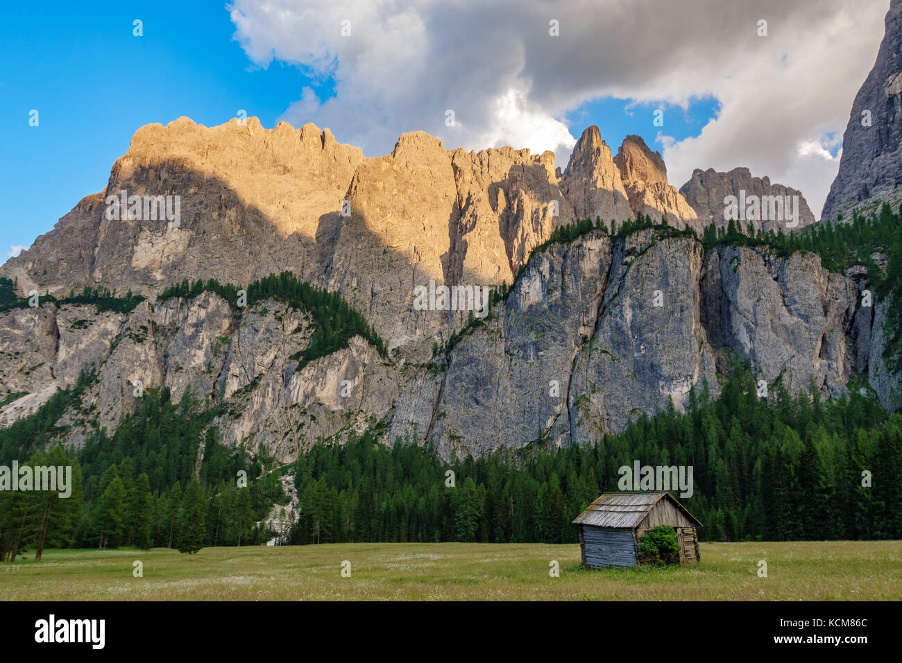 Dolomite rock mountains at dusk with shack Stock Photo - Alamy