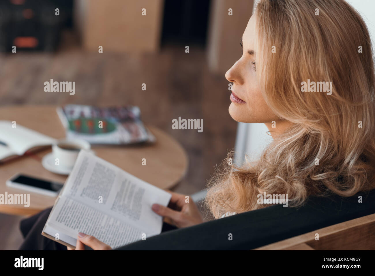Reading profile book adult hi-res stock photography and images - Alamy