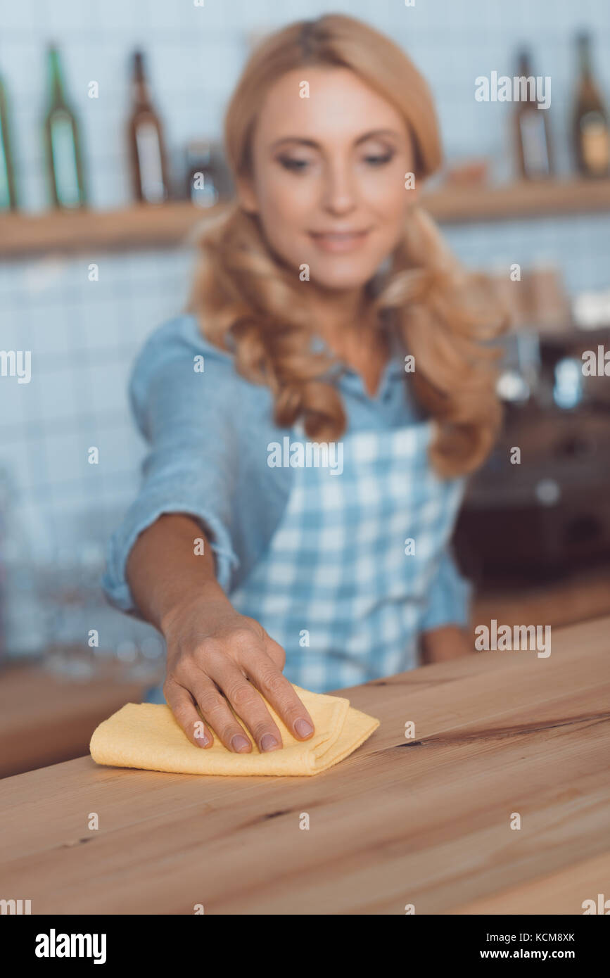 waitress cleaning bar counter Stock Photo - Alamy