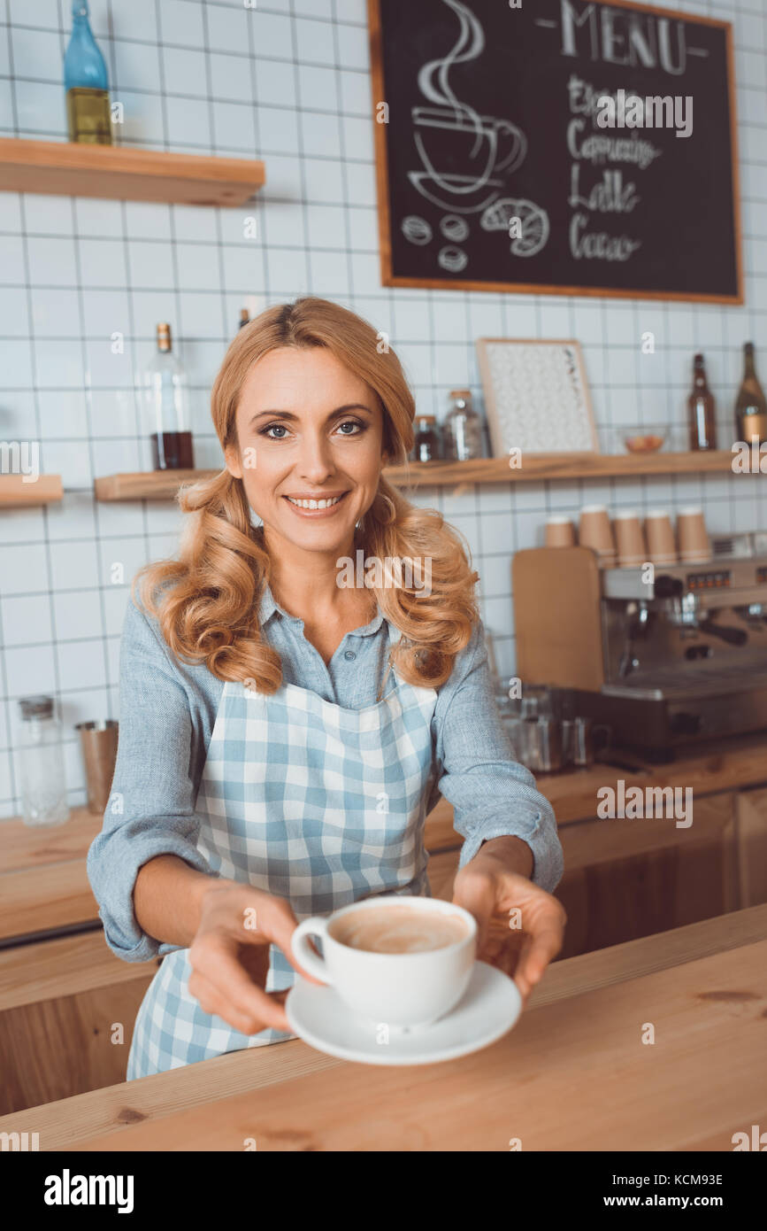 We are happy to serve you coffee cup hi-res stock photography and ...